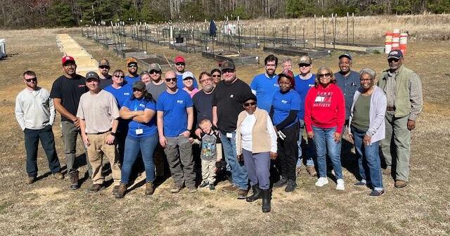 Dominion Energy employees help with raised bed program ...