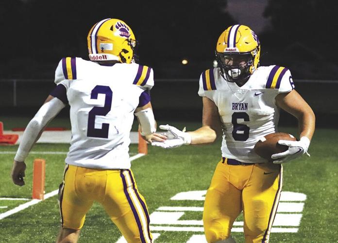 Bryan football's ground game, grit holds off Maumee for Week 2 victory ...