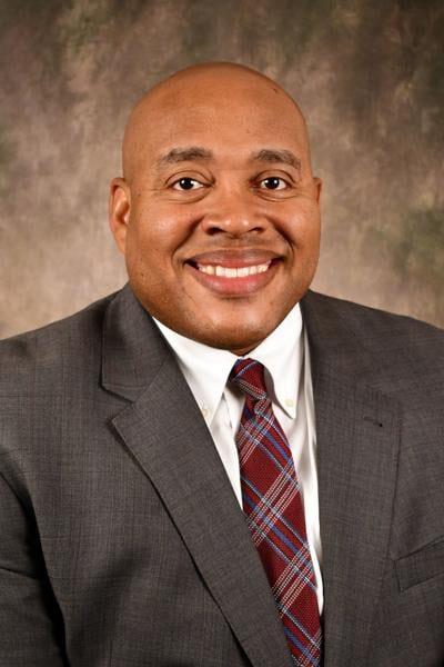 Banker, former professional basketball player finds time to give back ...