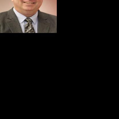 Robert M. Radwan promoted at Trautman Associates