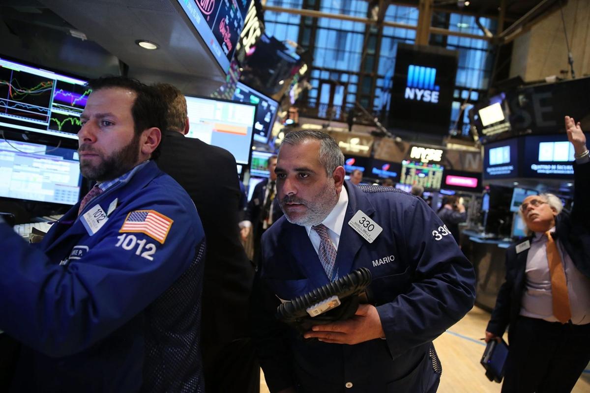 Nasdaq climbs on technology rally while energy shares push S&P lower