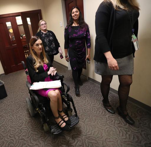 Quadriplegic judge sworn into office in Erie County