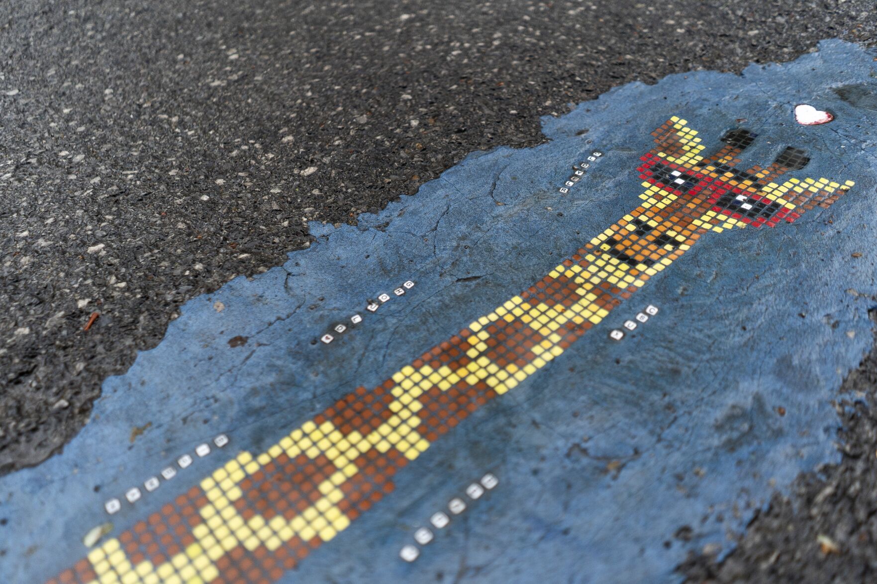 Potholes are still being artfully transformed in Buffalo