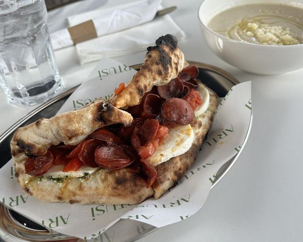 Artusi serves hand-held Neapolitan pizza at fast-casual spot