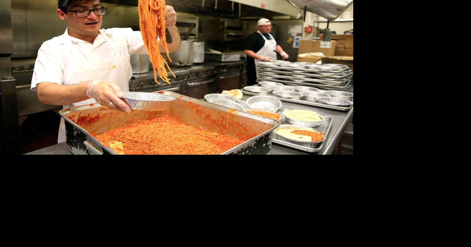 Chef's prepares spaghetti parm meals for Millard Fillmore Hospital