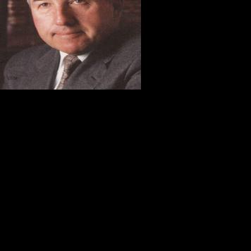 Franklin G. Downing Sr., head of Towne Automotive Group