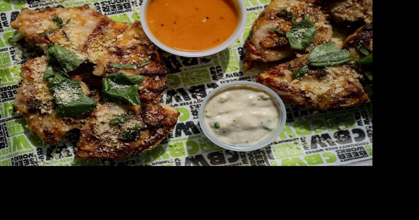 Explore Community Beer Works' menu and space