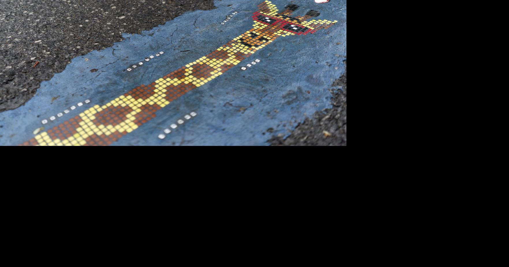 Potholes are still being artfully transformed in Buffalo