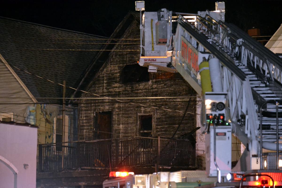 Woman in fair condition after Lockport house fire