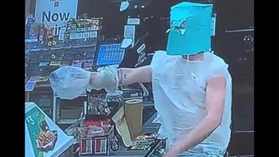 Paper or plastic: Falls police on the lookout for bag-wearing thief