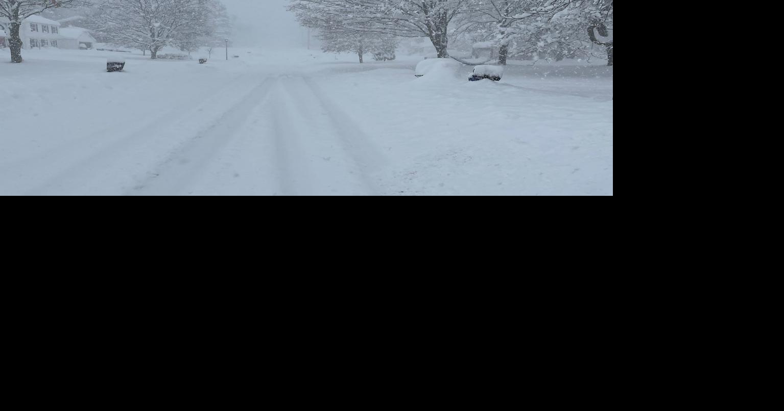 In East Aurora, plows and snowblowers struggle with 22 inches of wet snow