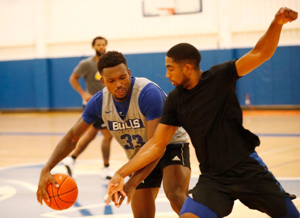 Blue Collar team of UB alums moves on in TBT play