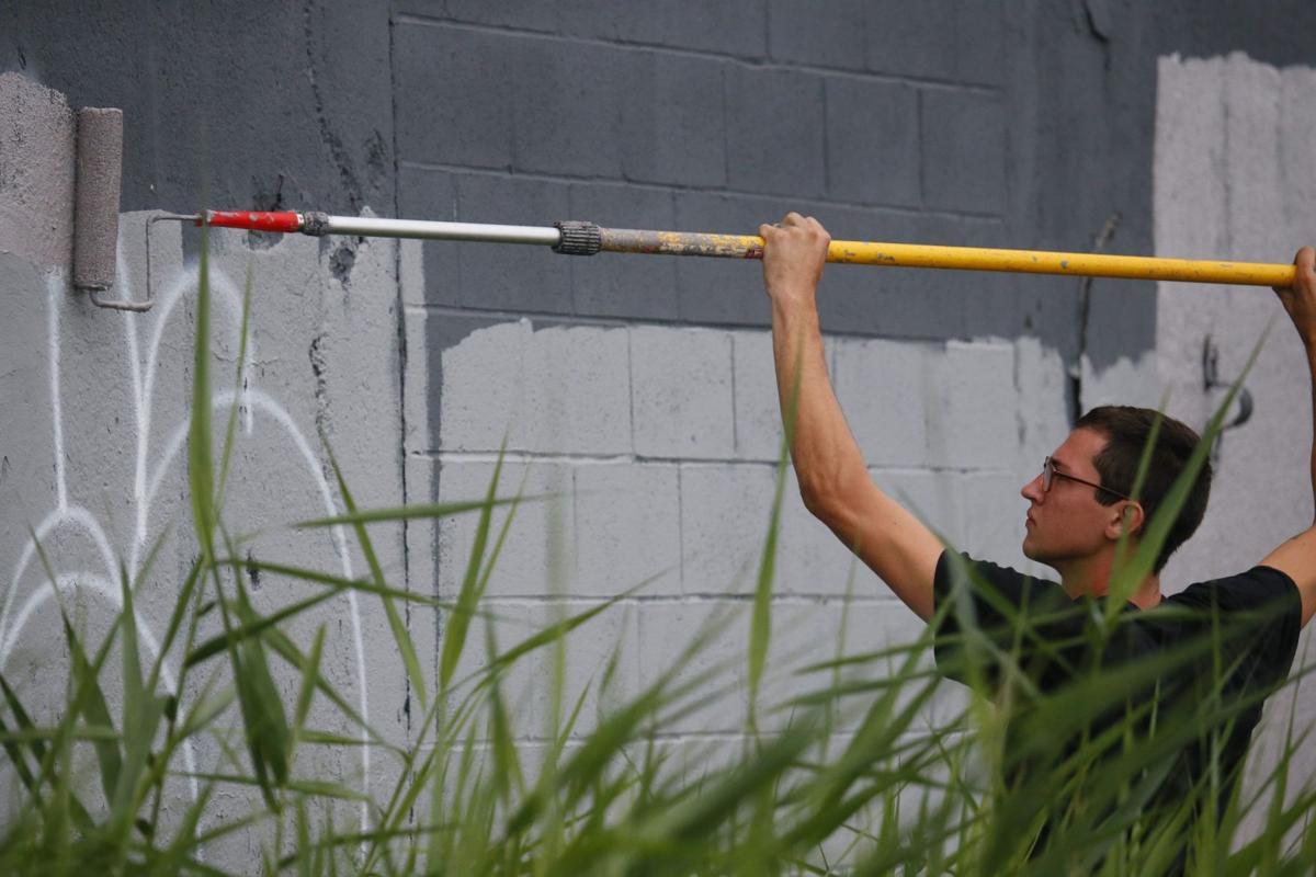 Buffalo ‘BCUZ’ tagger starts court sentence removing graffiti