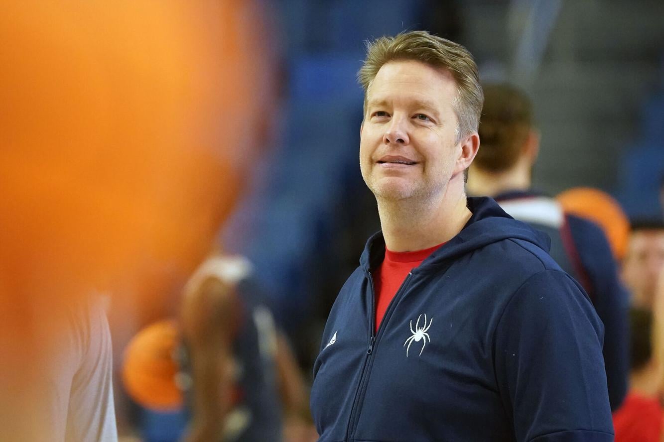 How Richmond basketball coach Chris Mooney saved wedding of Buffalo ...