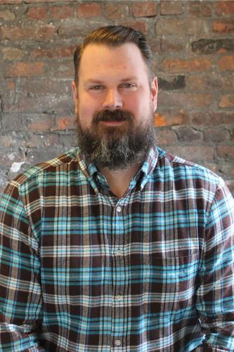Brian Slevar promoted at Carmina Wood Morris DPC