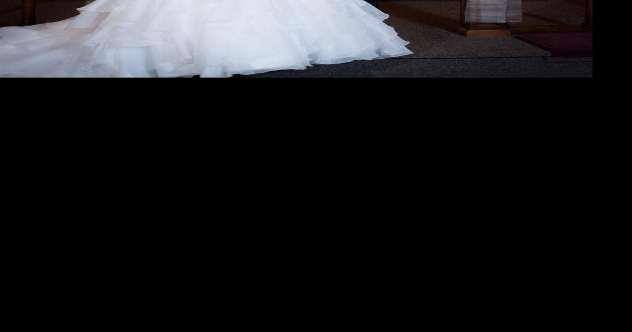 Laura M. Rovner and Aric J. Fecher wed in Zion Lutheran Church