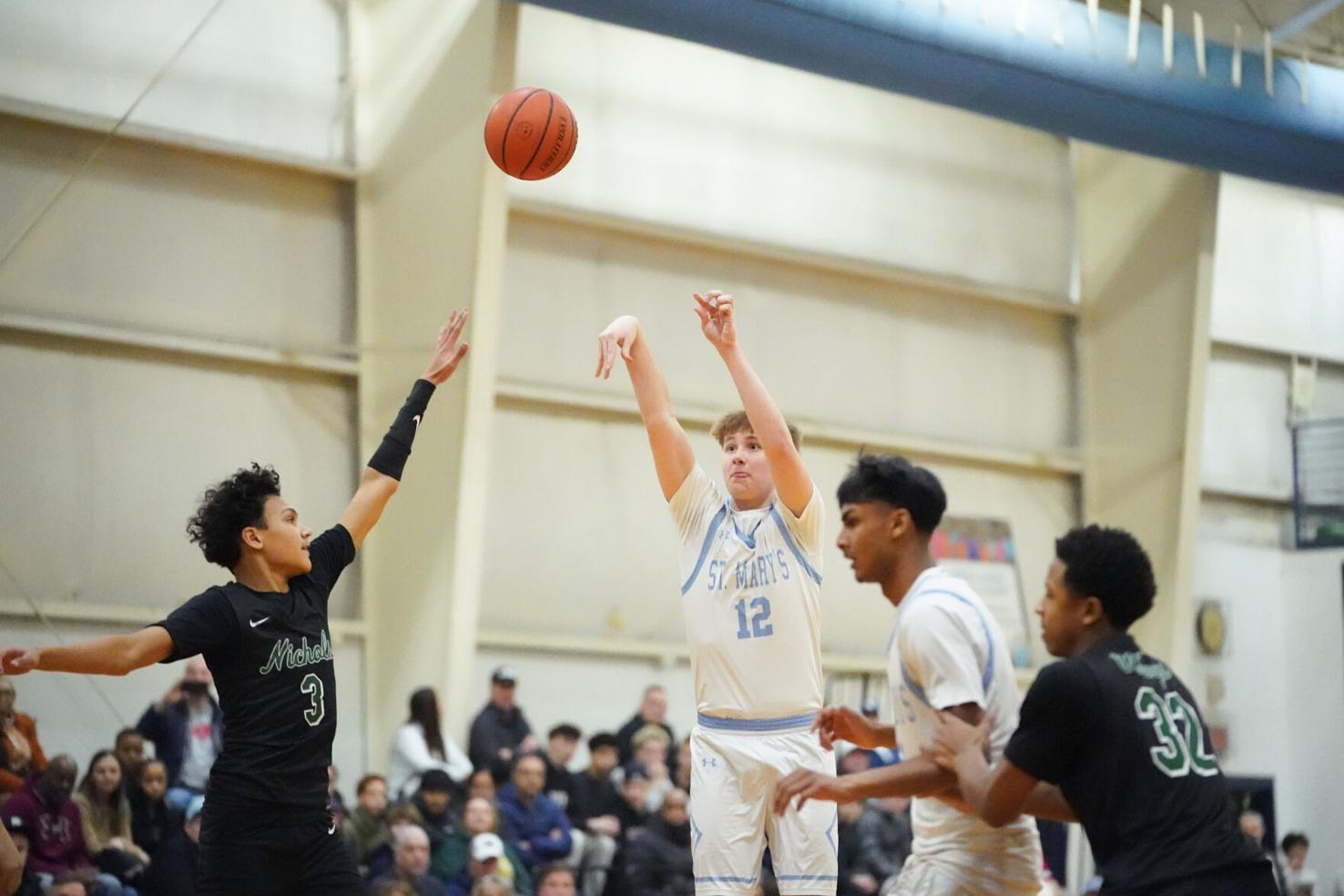 Photos: Nichols boys basketball beats St Mary's, 62-48