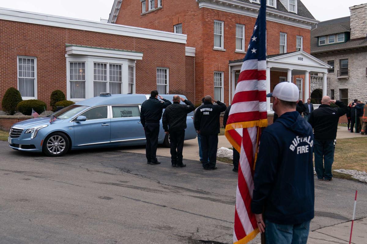 Along Buffalo's streets, a community pauses to honor a fallen firefighter