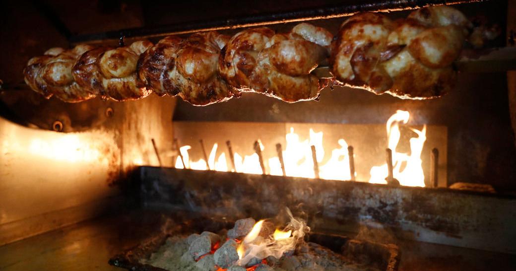 At Almaza Grill, the swift feeding of families with rotisserie chicken