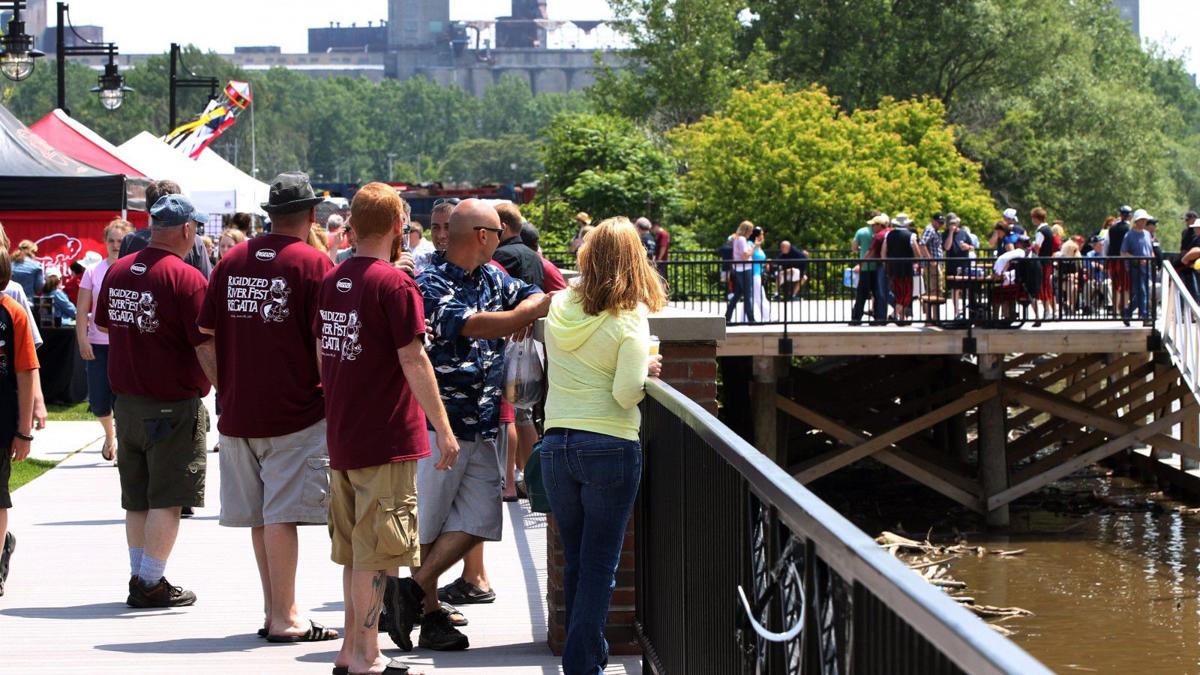 As River Fest marks its 15th year, neighborhood blossoms around it