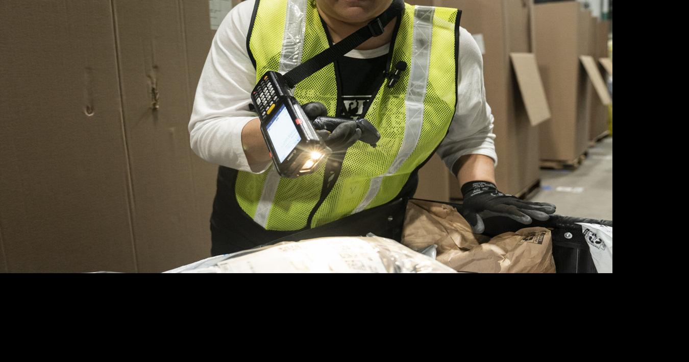 Photos: Reporter Samantha Christmann tries out work at Amazon sortation ...