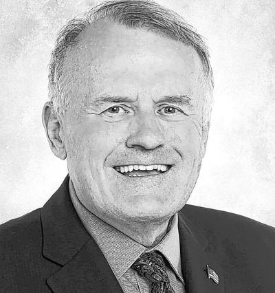 GAUGHAN, Dennis