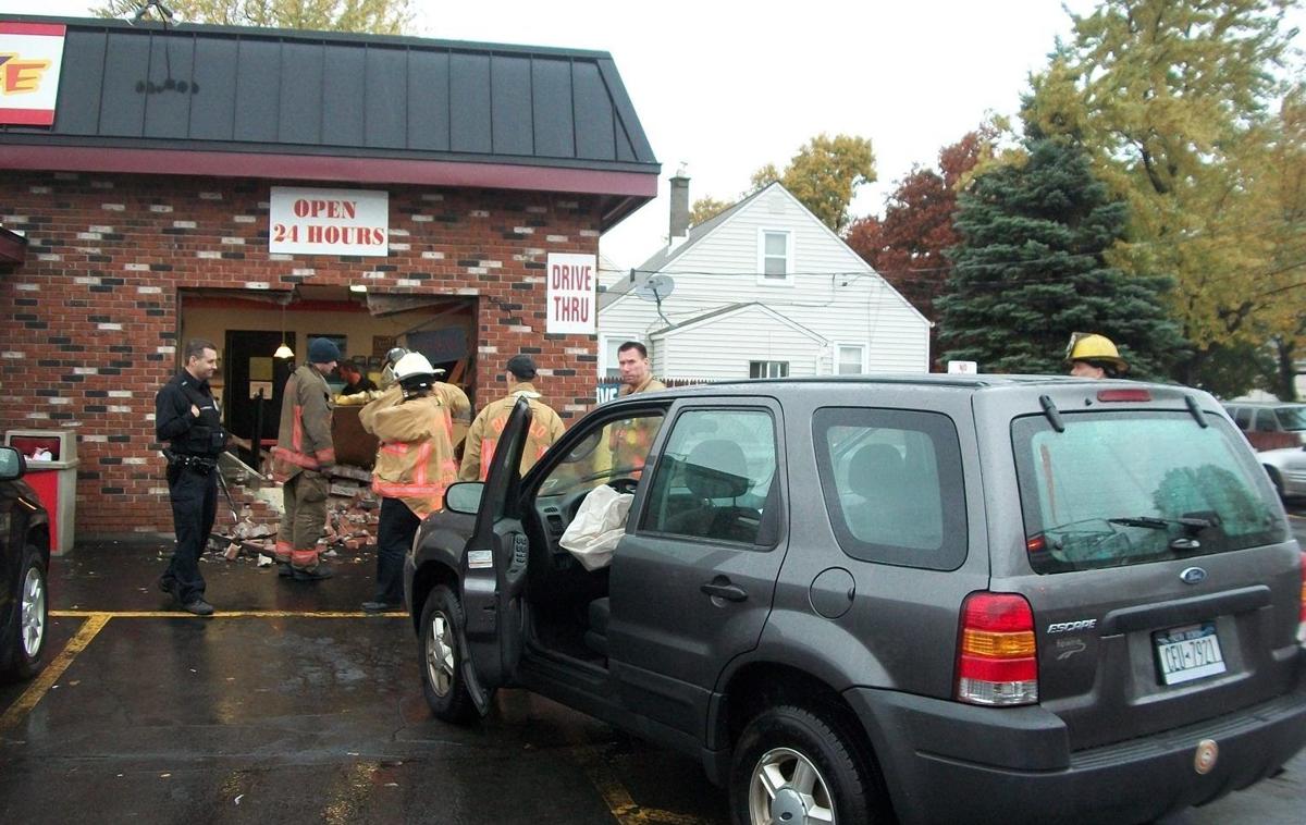 Three injured as SUV crashes into doughnut shop
