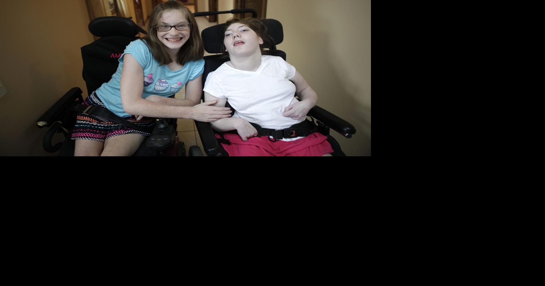 Disabled twins enjoy accessible addition to Depew home