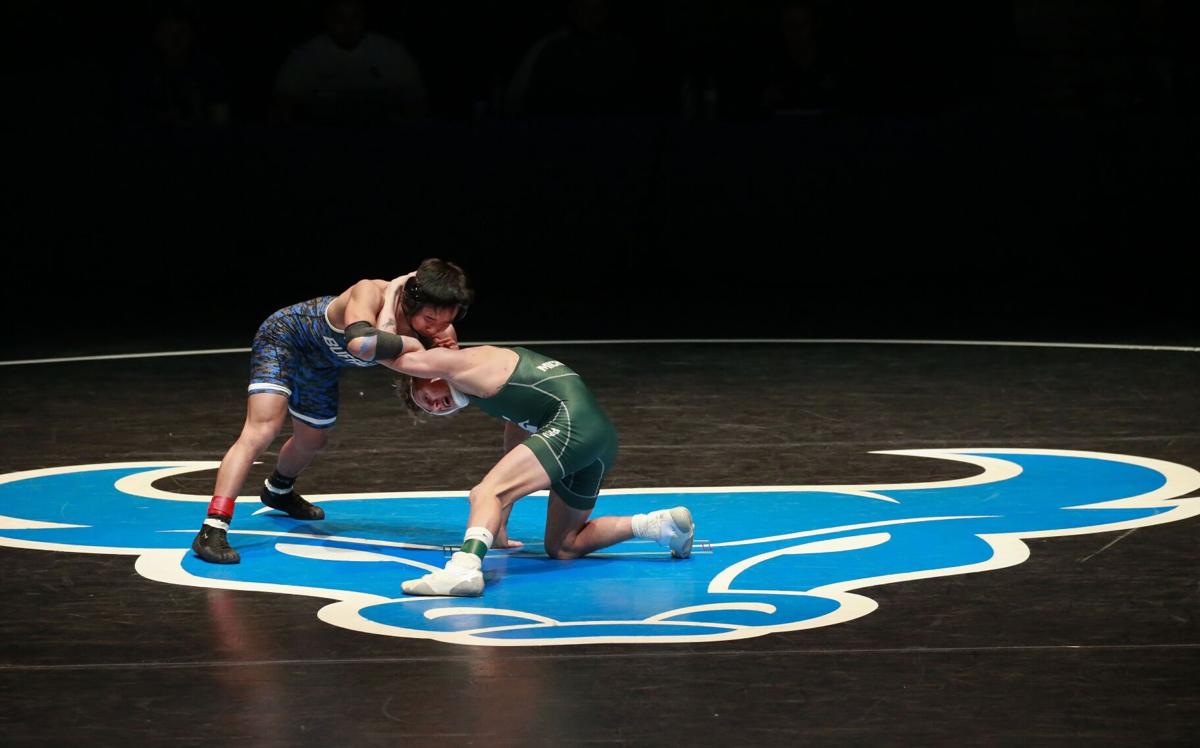 UB, high school wrestling at center stage in unusual venue