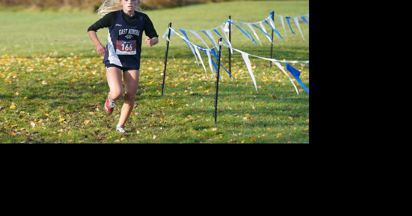 East Aurora's boys, girls x-country teams state champs again