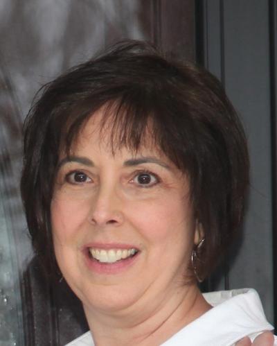 Nancy E. Engel, co-owned Strategic Asset Management with husband