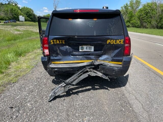 State trooper treated for minor injuries after patrol car is struck on ...