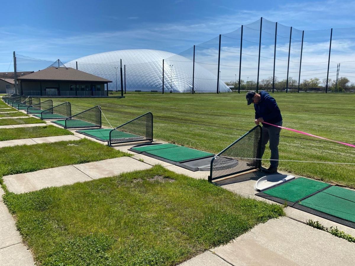 Watch now: Social-distanced swing polishing at Tonawanda's golf range ...