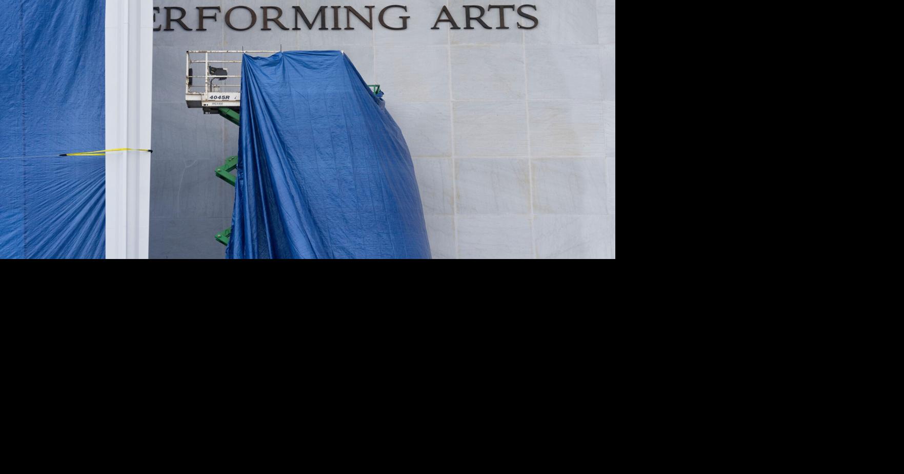 Photos of Trump's name being added to the Kennedy Center