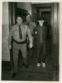 Suspect in threats case convicted of 1979 priest slaying