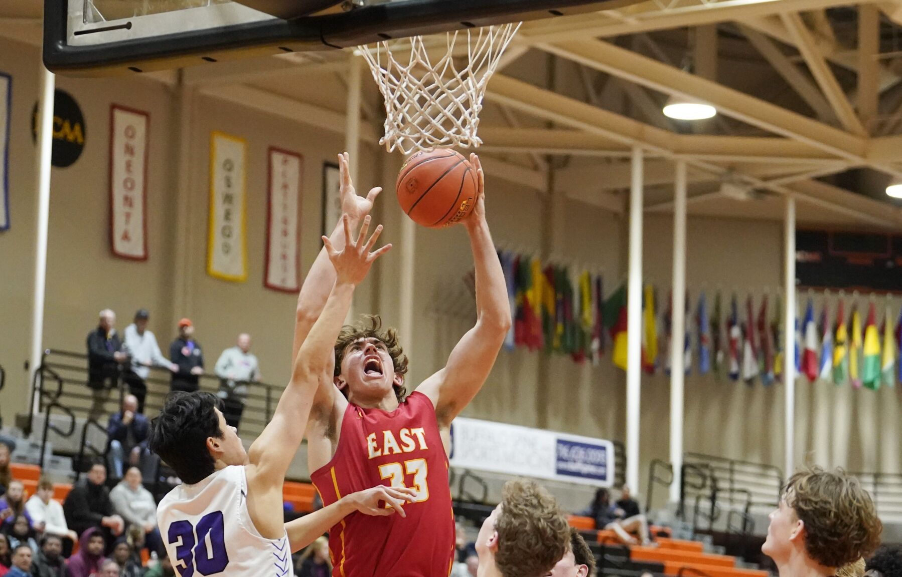 Williamsville East, South boys basketball teams advance