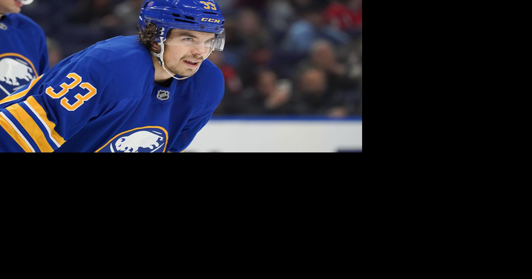 Buffalo Sabres defenseman Ryan Johnson hits the books