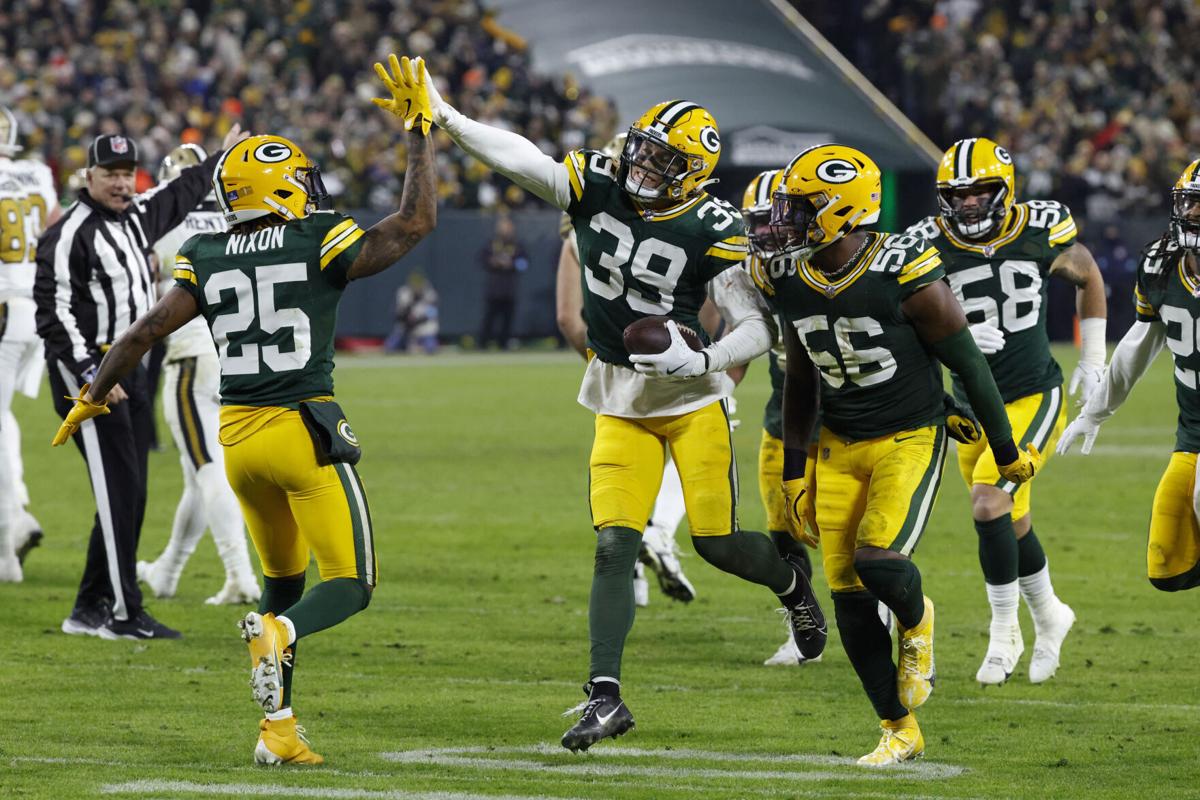 Packers throttle Saints to clinch playoff spot