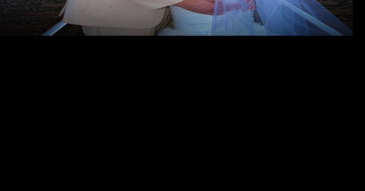 Andrew Dybka and Rebecca Tarnowski marry in St. Gabriel Catholic Church