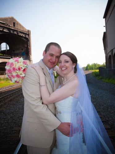 Andrew Dybka and Rebecca Tarnowski marry in St. Gabriel Catholic Church