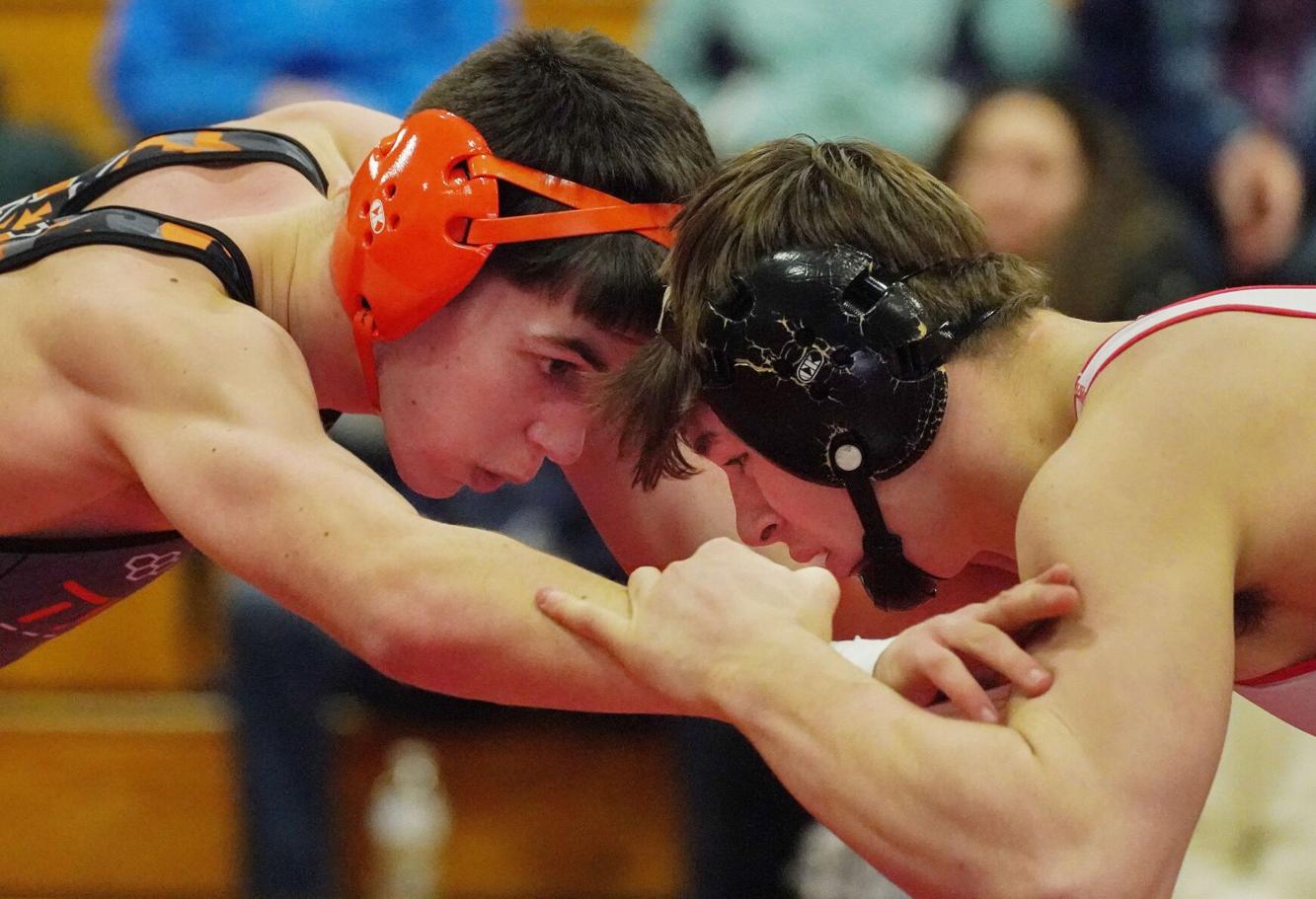 Photos: St. Francis, Amherst battle on the mat