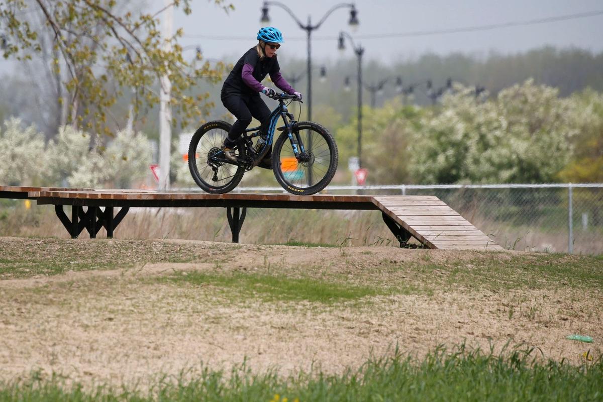 Ramps, tunnels, trails and more: New bike park opens on the Outer ...