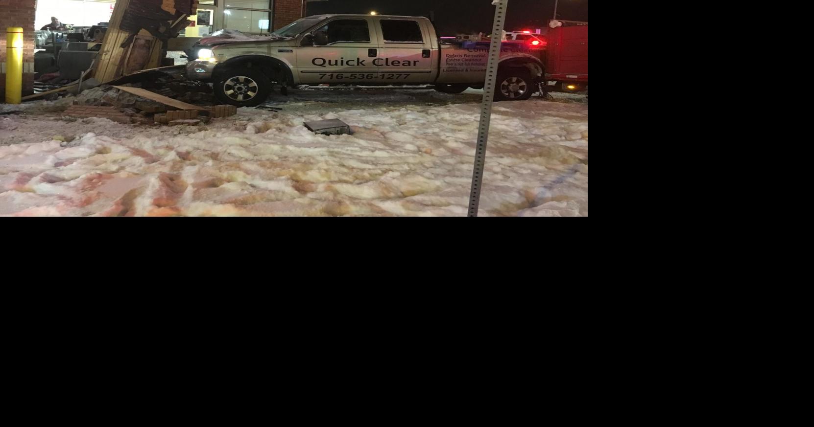 Pickup towing trailer jackknifes into Tim Hortons drive-thru