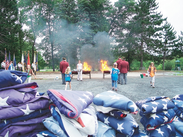 Flags receive honorable farewell | | burnettcountysentinel.com