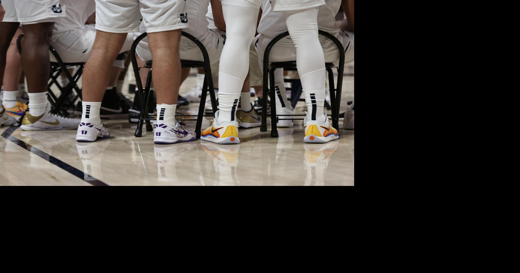team huddle in the USU Smith Spectrum | | cachevalleydaily.com