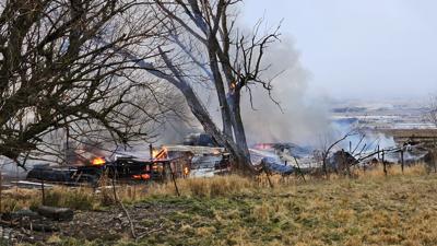 Firefighters suspect embers from burn barrel the cause of fire near ...