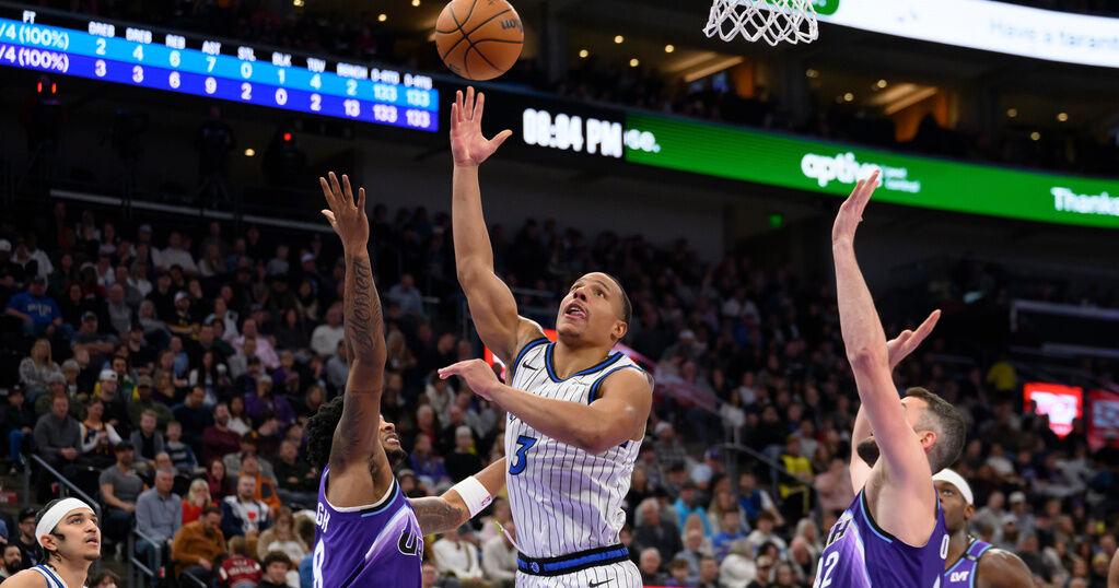 Desmond Bane scores 32 points, including winning layup, to lead Magic ...