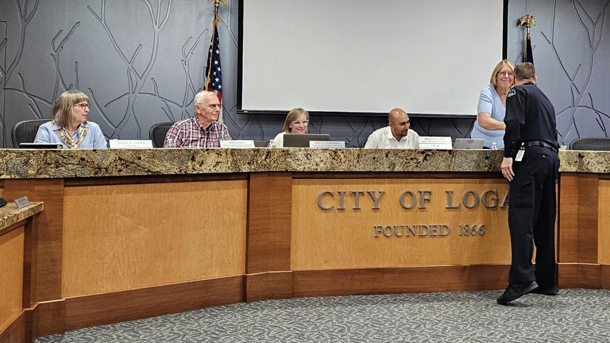 Jeff Simmons sworn in as new chief of the Logan City Police Department ...