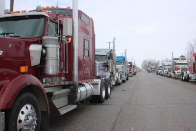 Procession of trucks show support for fellow trucker | News ...