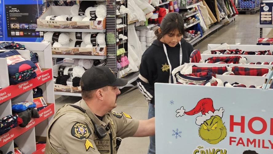 Shop with a Cop brings Christmas spirit to local kids and law ...